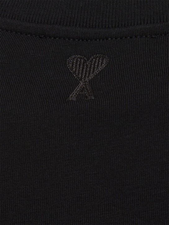 Logo printed boxy cotton t-shirt - AMI Paris - Men | Luisaviaroma