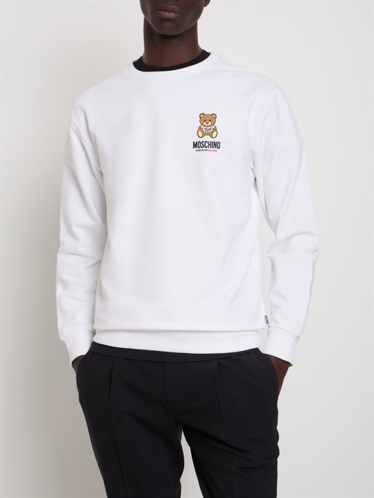 Teddy print cotton crewneck sweater - Moschino - Men | Luisaviaroma