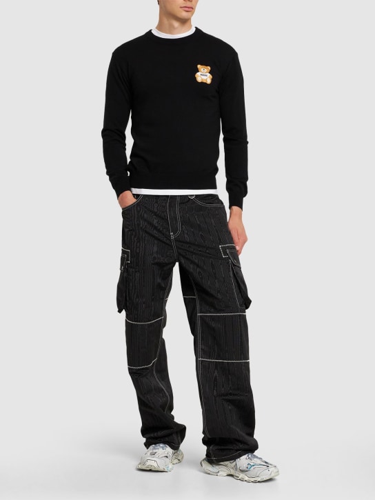 Teddy logo virgin wool knit sweater - Moschino - Men | Luisaviaroma